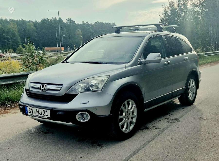 Grey Honda CR-V 2009 in Vilnius, with an engine capacity of 2.20 L and mileage of 268 thousand km for 5850 €, photo 7 on AUTOMOTO.COM.LV