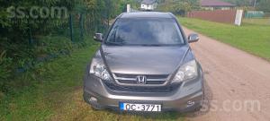 Pelēks Honda CR-V 2009 Rīga, ar dzinēja tilpumu 2.40 L un nobraukumu 101 tūkst. km par 7000 €, foto  vietnē AUTOMOTO.COM.LV