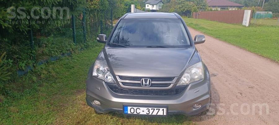 Pelēks Honda CR-V 2009 Rīga, ar dzinēja tilpumu 2.40 L un nobraukumu 101 tūkst. km par 7000 €, foto 1 vietnē AUTOMOTO.COM.LV