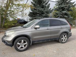 Grey Honda CR-V 2009 in Marijampole, with an engine capacity of 2.00 L and mileage of 253 thousand km for 3250 €, photo 7 on AUTOMOTO.COM.LV