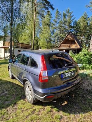 Grey Honda CR-V 2009 in Riga, with an engine capacity of 2.20 L and mileage of 270 thousand km for 4800 €, photo 3 on AUTOMOTO.COM.LV