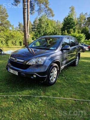 Grey Honda CR-V 2009 in Riga, with an engine capacity of 2.20 L and mileage of 270 thousand km for 4800 €, photo 9 on AUTOMOTO.COM.LV