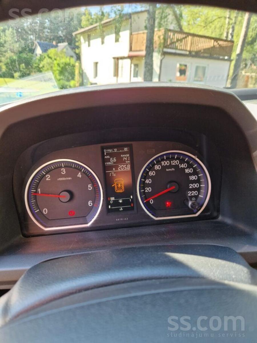 Grey Honda CR-V 2009 in Riga, with an engine capacity of 2.20 L and mileage of 270 thousand km for 4800 €, photo 15 on AUTOMOTO.COM.LV