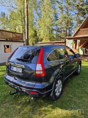 Grey Honda CR-V 2009 in Riga, with an engine capacity of 2.20 L and mileage of 270 thousand km for 4800 €, photo 19 on AUTOMOTO.COM.LV