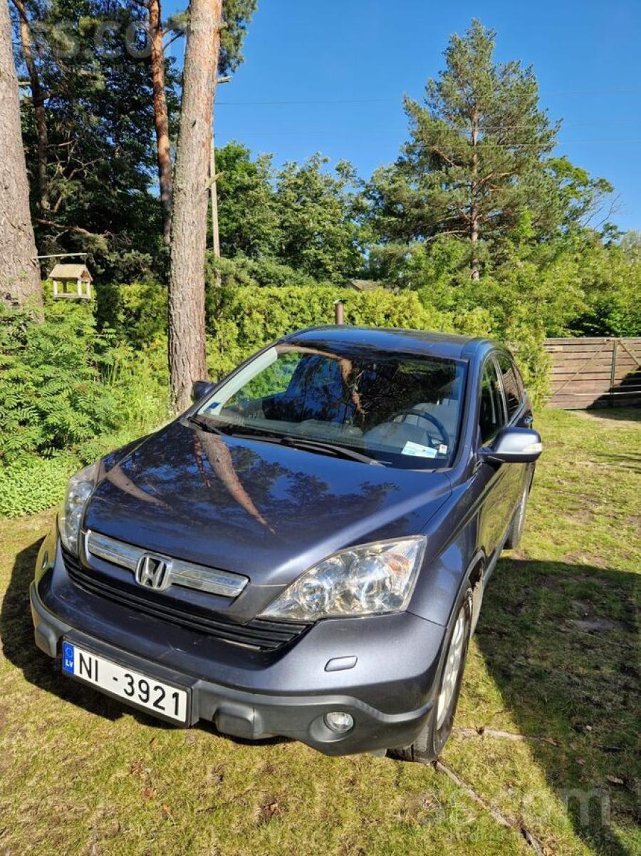 Grey Honda CR-V 2009 in Riga, with an engine capacity of 2.20 L and mileage of 270 thousand km for 4800 €, photo 20 on AUTOMOTO.COM.LV