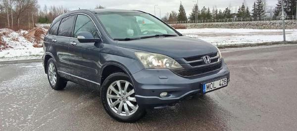 Pelēks Honda CR-V 2010 Utena, ar dzinēja tilpumu 2.20 L un nobraukumu 269 tūkst. km par 7550 €, foto 1 vietnē AUTOMOTO.COM.LV