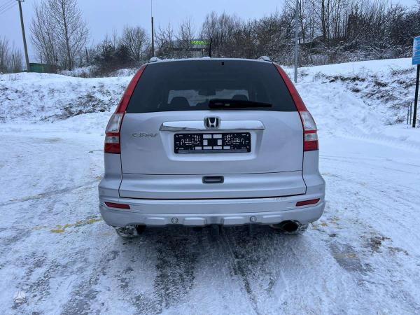 Grey Honda CR-V 2010 in Vilnius, with an engine capacity of 2.20 L and mileage of 275 thousand km for 6700 €, photo 6 on AUTOMOTO.COM.LV