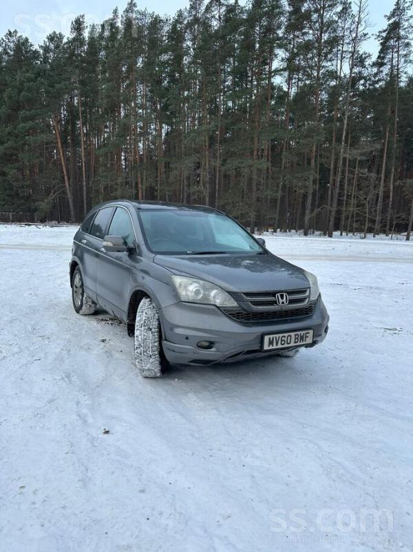 Grey Honda CR-V 2010 in Liepaja, with an engine capacity of 2.20 L and mileage of 200 thousand km for 2000 €, photo 2 on AUTOMOTO.COM.LV