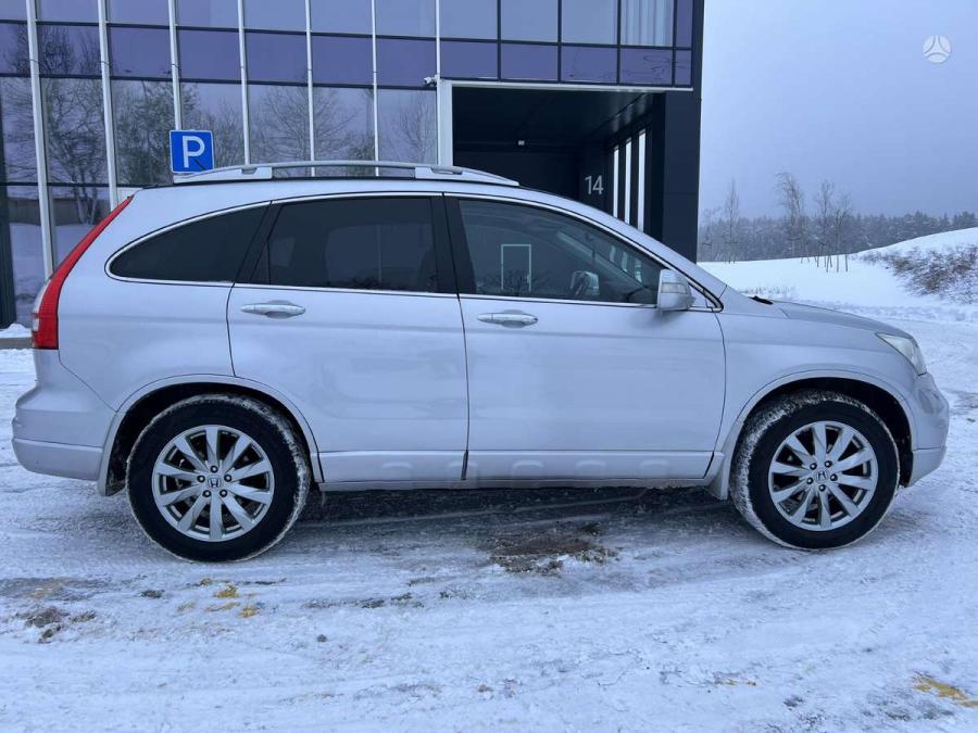 Grey Honda CR-V 2010 in Vilnius, with an engine capacity of 2.20 L and mileage of 280 thousand km for 6450 €, photo 4 on AUTOMOTO.COM.LV