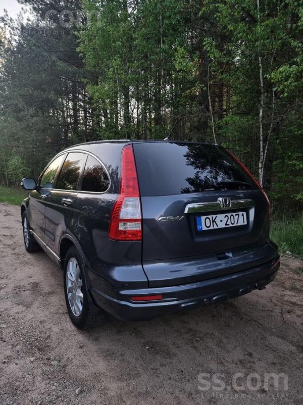 Grey Honda CR-V 2010 in Daugavpils, with an engine capacity of 2.20 L and mileage of 248 thousand km for 7800 €, photo 5 on AUTOMOTO.COM.LV