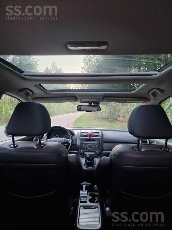 Grey Honda CR-V 2010 in Daugavpils, with an engine capacity of 2.20 L and mileage of 248 thousand km for 7800 €, photo 7 on AUTOMOTO.COM.LV