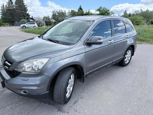 Grey Honda CR-V 2010 in Siauliai, with an engine capacity of 2.20 L and mileage of 289 thousand km for 6500 €, photo  on AUTOMOTO.COM.LV
