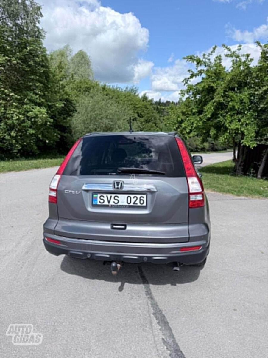 Grey Honda CR-V 2010 in Siauliai, with an engine capacity of 2.20 L and mileage of 289 thousand km for 6500 €, photo 6 on AUTOMOTO.COM.LV