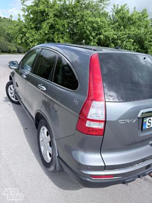 Grey Honda CR-V 2010 in Siauliai, with an engine capacity of 2.20 L and mileage of 289 thousand km for 6500 €, photo 7 on AUTOMOTO.COM.LV