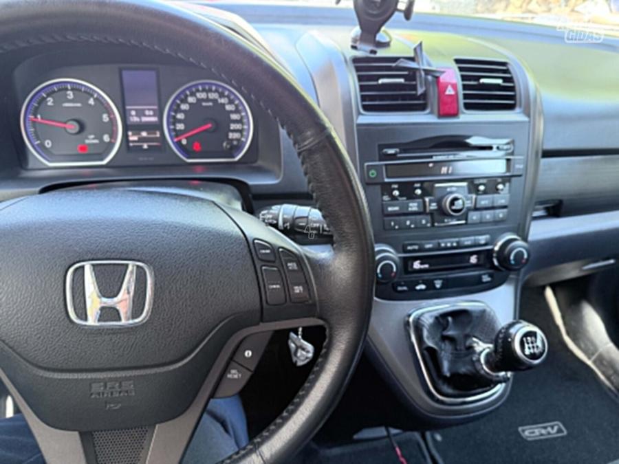 Grey Honda CR-V 2010 in Siauliai, with an engine capacity of 2.20 L and mileage of 289 thousand km for 6500 €, photo 11 on AUTOMOTO.COM.LV