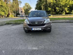 Grey Honda CR-V 2010 in Vilnius, with an engine capacity of 2.20 L and mileage of 325 thousand km for 6200 €, photo 3 on AUTOMOTO.COM.LV