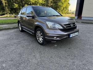 Grey Honda CR-V 2010 in Vilnius, with an engine capacity of 2.20 L and mileage of 325 thousand km for 6200 €, photo 4 on AUTOMOTO.COM.LV