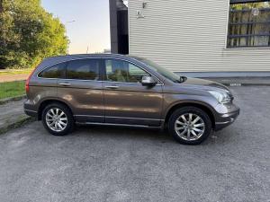 Grey Honda CR-V 2010 in Vilnius, with an engine capacity of 2.20 L and mileage of 325 thousand km for 6200 €, photo 5 on AUTOMOTO.COM.LV