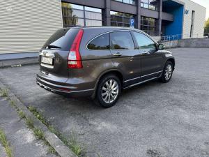 Grey Honda CR-V 2010 in Vilnius, with an engine capacity of 2.20 L and mileage of 325 thousand km for 6200 €, photo 6 on AUTOMOTO.COM.LV