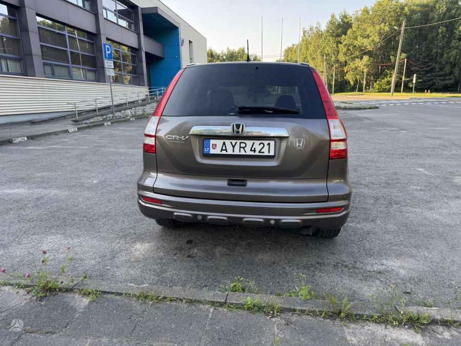 Grey Honda CR-V 2010 in Vilnius, with an engine capacity of 2.20 L and mileage of 325 thousand km for 6200 €, photo 7 on AUTOMOTO.COM.LV