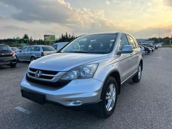 Grey Honda CR-V 2010 in Utena, with an engine capacity of 2.20 L and mileage of 233 thousand km for 6300 €, photo 6 on AUTOMOTO.COM.LV