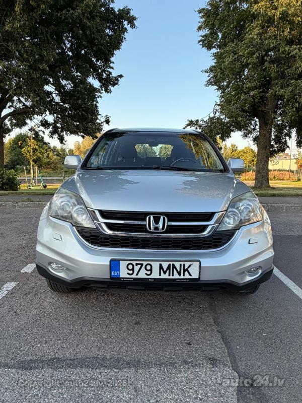 Pelēks Honda CR-V 2010 Tallina, ar dzinēja tilpumu 2.00 L un nobraukumu 132 tūkst. km par 9500 €, foto 9 vietnē AUTOMOTO.COM.LV