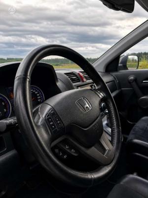 Grey Honda CR-V 2010 in Vilnius, with an engine capacity of 2.20 L and mileage of 302 thousand km for 6950 €, photo 12 on AUTOMOTO.COM.LV