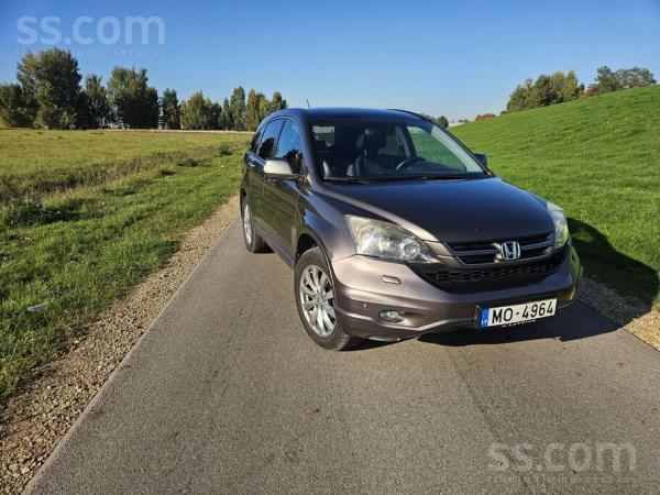 Grey Honda CR-V 2010 in Riga, with an engine capacity of 2.20 L and mileage of 363 thousand km for 4950 €, photo 5 on AUTOMOTO.COM.LV