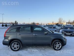 Grey Honda CR-V 2011 in Daugavpils, with an engine capacity of 2.20 L and mileage of 0 thousand km for 7900 €, photo 6 on AUTOMOTO.COM.LV