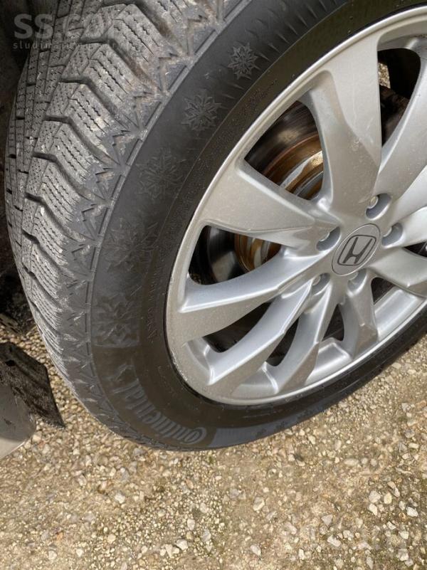 Grey Honda CR-V 2011 in Riga, with an engine capacity of 2.20 L and mileage of 0 thousand km for 7899 €, photo 6 on AUTOMOTO.COM.LV
