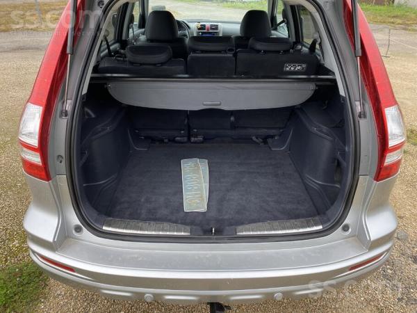 Grey Honda CR-V 2011 in Riga, with an engine capacity of 2.20 L and mileage of 0 thousand km for 7899 €, photo 7 on AUTOMOTO.COM.LV