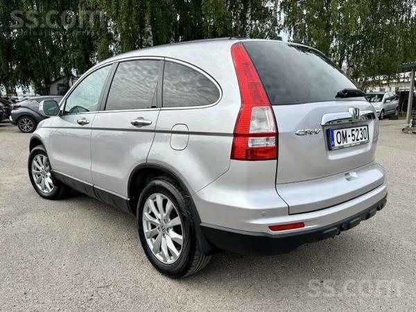 Grey Honda CR-V 2011 in Riga, with an engine capacity of 2.20 L and mileage of 0 thousand km for 7550 €, photo 4 on AUTOMOTO.COM.LV