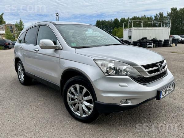 Grey Honda CR-V 2011 in Riga, with an engine capacity of 2.20 L and mileage of 0 thousand km for 7550 €, photo 2 on AUTOMOTO.COM.LV