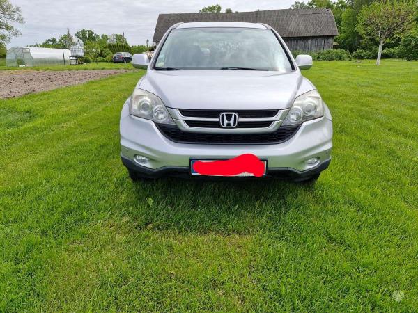 Pelēks Honda CR-V 2011 Panevēža, ar dzinēja tilpumu 2.20 L un nobraukumu 260 tūkst. km par 7000 €, foto 6 vietnē AUTOMOTO.COM.LV