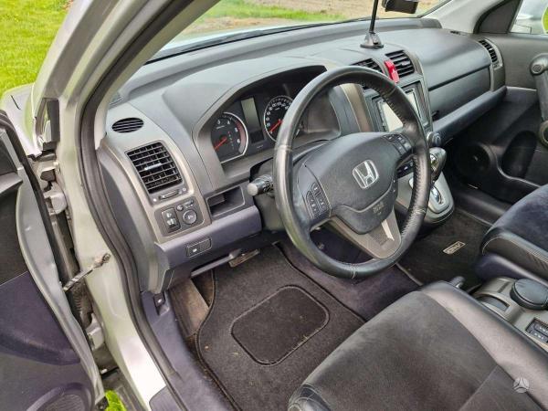 Pelēks Honda CR-V 2011 Panevēža, ar dzinēja tilpumu 2.20 L un nobraukumu 260 tūkst. km par 7000 €, foto 8 vietnē AUTOMOTO.COM.LV