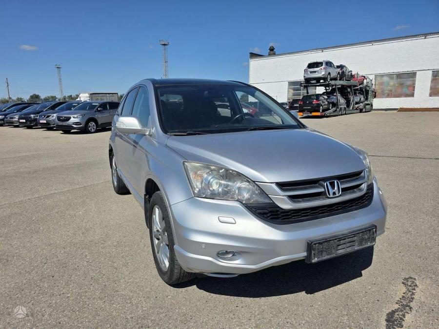 Pelēks Honda CR-V 2011 Marijampole, ar dzinēja tilpumu 2.20 L un nobraukumu 330 tūkst. km par 4800 €, foto 18 vietnē AUTOMOTO.COM.LV