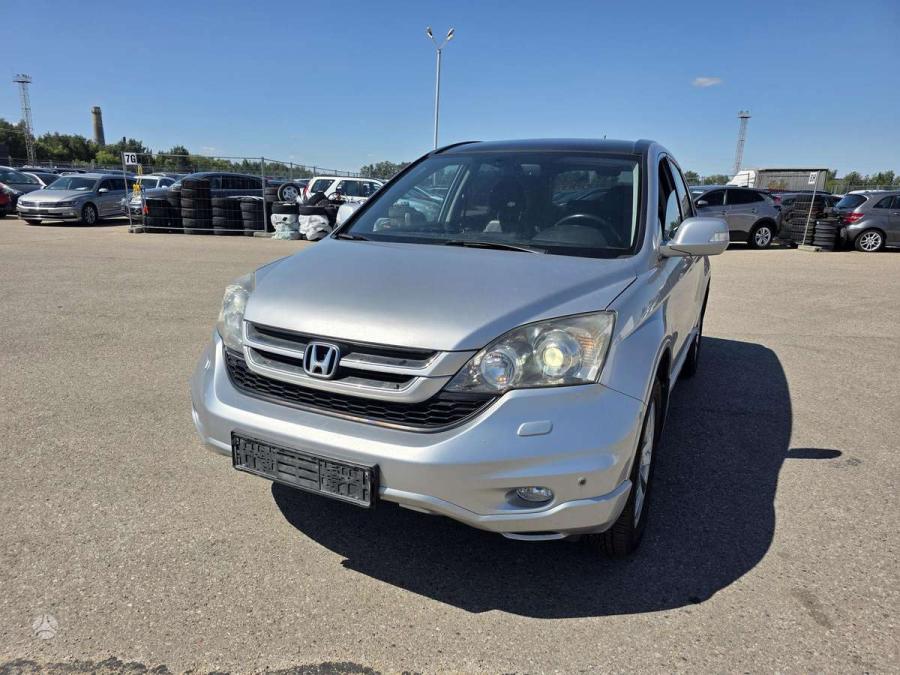 Pelēks Honda CR-V 2011 Marijampole, ar dzinēja tilpumu 2.20 L un nobraukumu 330 tūkst. km par 4800 €, foto 20 vietnē AUTOMOTO.COM.LV