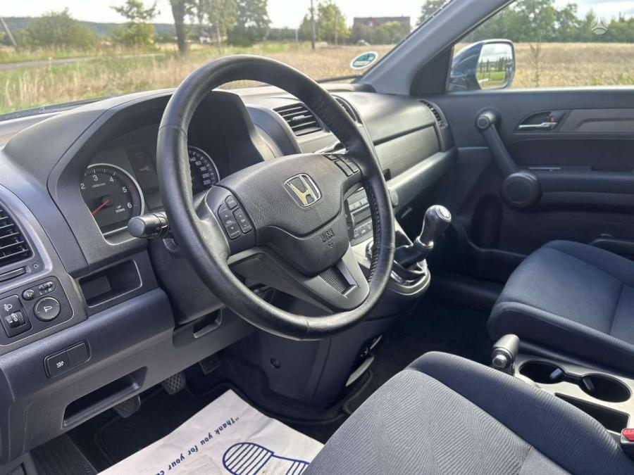 Grey Honda CR-V 2011 in Kaisiadorys, with an engine capacity of 2.20 L and mileage of 235 thousand km for 6490 €, photo 13 on AUTOMOTO.COM.LV