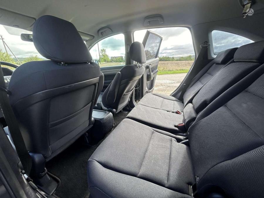 Grey Honda CR-V 2011 in Kaisiadorys, with an engine capacity of 2.20 L and mileage of 235 thousand km for 6490 €, photo 25 on AUTOMOTO.COM.LV