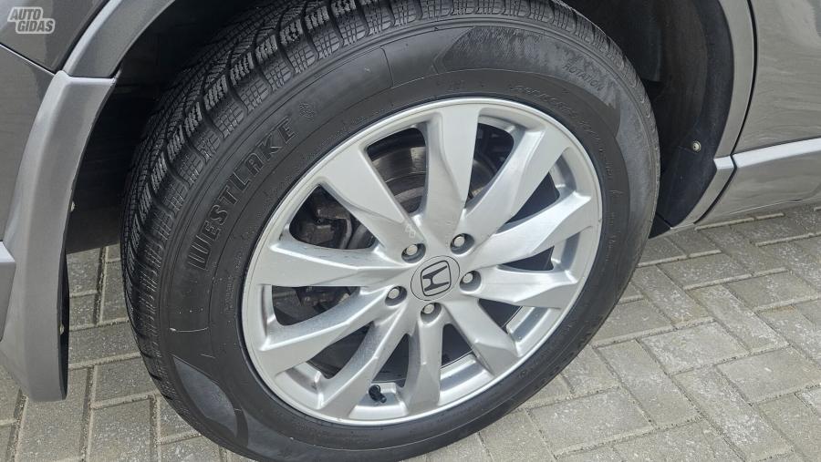 Grey Honda CR-V 2011 in Vilnius, with an engine capacity of 2.20 L and mileage of 217 thousand km for 7890 €, photo 8 on AUTOMOTO.COM.LV