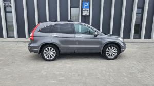 Grey Honda CR-V 2011 in Vilnius, with an engine capacity of 2.20 L and mileage of 217 thousand km for 7890 €, photo 9 on AUTOMOTO.COM.LV