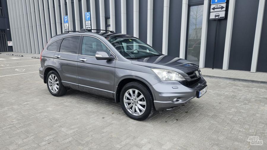 Grey Honda CR-V 2011 in Vilnius, with an engine capacity of 2.20 L and mileage of 217 thousand km for 7890 €, photo 10 on AUTOMOTO.COM.LV