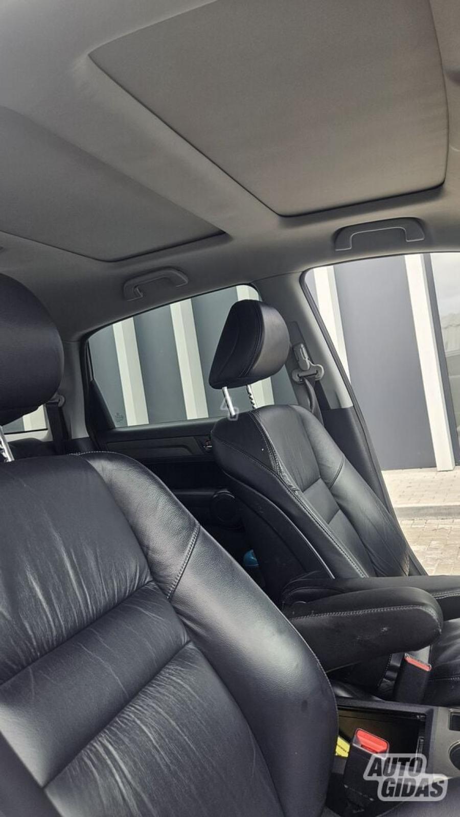 Grey Honda CR-V 2011 in Vilnius, with an engine capacity of 2.20 L and mileage of 217 thousand km for 7890 €, photo 11 on AUTOMOTO.COM.LV
