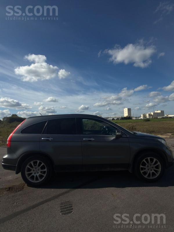 Pelēks Honda CR-V 2011 Rīga, ar dzinēja tilpumu 2.20 L un nobraukumu 351 tūkst. km par 6500 €, foto 6 vietnē AUTOMOTO.COM.LV