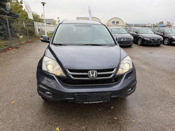 Grey Honda CR-V 2011 in Marijampole, with an engine capacity of 2.20 L and mileage of 261 thousand km for 4250 €, photo 3 on AUTOMOTO.COM.LV