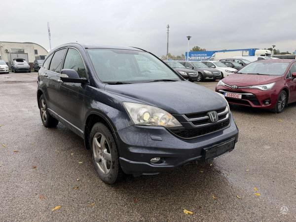Grey Honda CR-V 2011 in Marijampole, with an engine capacity of 2.20 L and mileage of 261 thousand km for 4250 €, photo 4 on AUTOMOTO.COM.LV