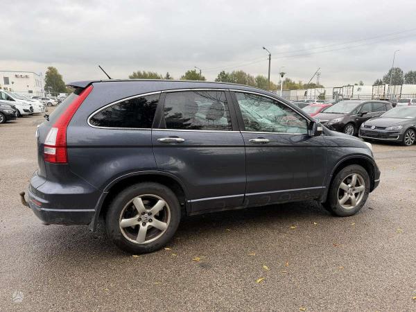 Grey Honda CR-V 2011 in Marijampole, with an engine capacity of 2.20 L and mileage of 261 thousand km for 4250 €, photo 5 on AUTOMOTO.COM.LV