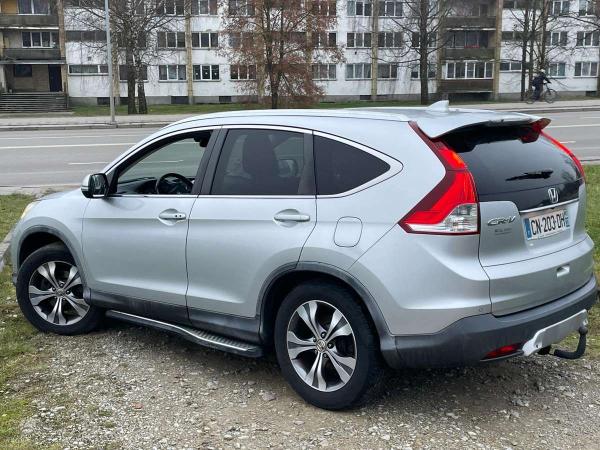 Pelēks Honda CR-V 2012 Alīta, ar dzinēja tilpumu 2.20 L un nobraukumu 180 tūkst. km par 9900 €, foto 3 vietnē AUTOMOTO.COM.LV