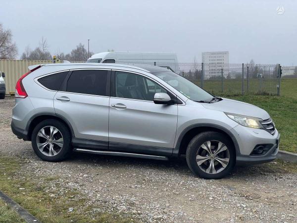 Pelēks Honda CR-V 2012 Alīta, ar dzinēja tilpumu 2.20 L un nobraukumu 180 tūkst. km par 9900 €, foto 6 vietnē AUTOMOTO.COM.LV