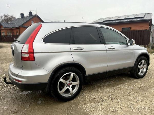 Grey Honda CR-V 2012 in Kaisiadorys, with an engine capacity of 2.20 L and mileage of 268 thousand km for 6450 €, photo 7 on AUTOMOTO.COM.LV